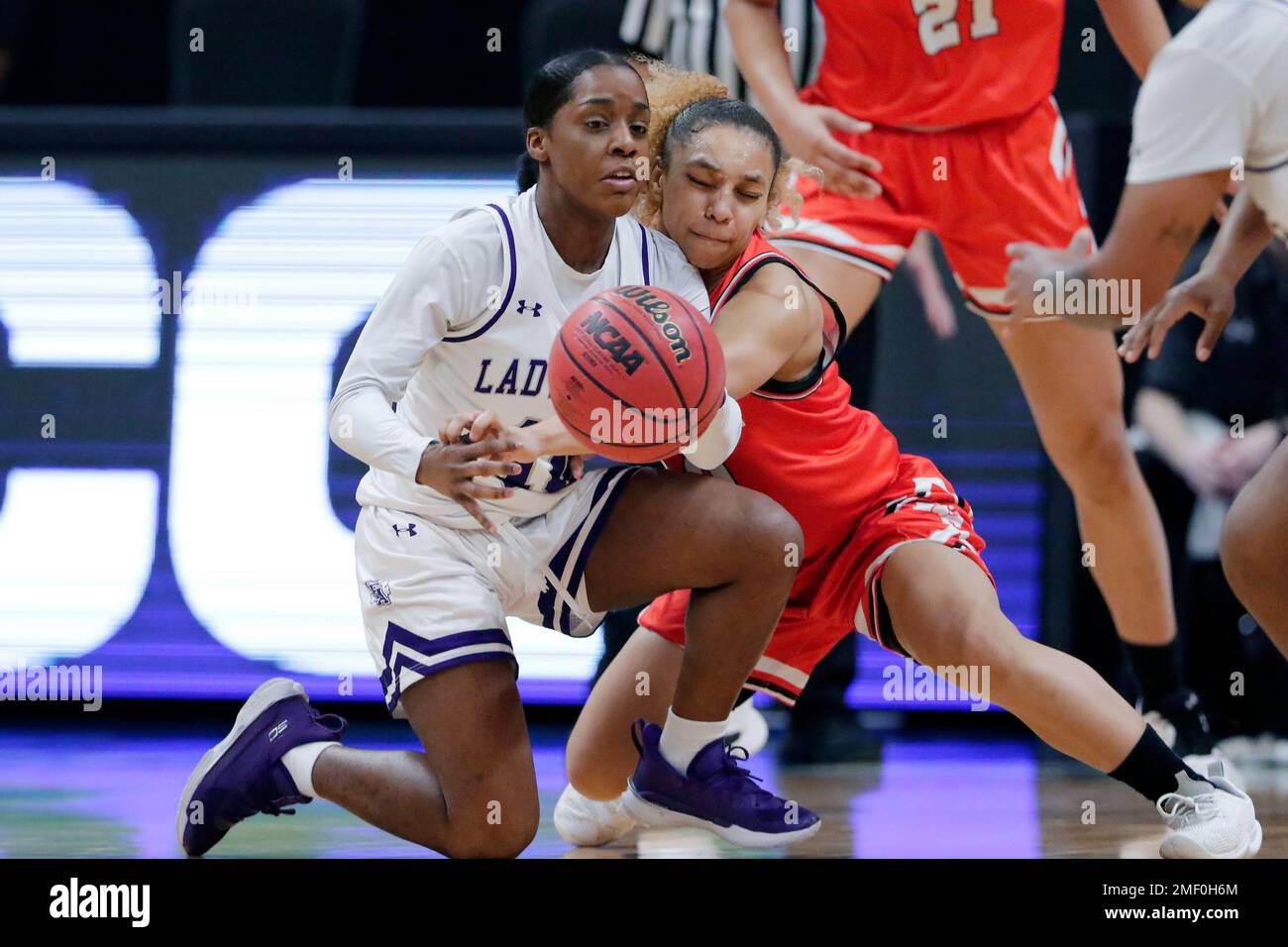 Sam Houston State guard Faith Cook, right, knocks the ball away from ...