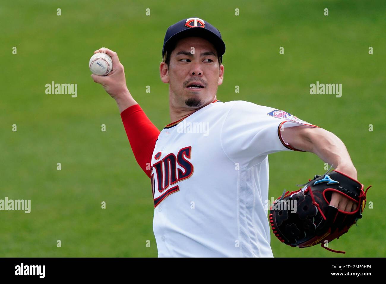 Minnesota Twins starting pitcher Kenta Maeda (18) warms up before a ...