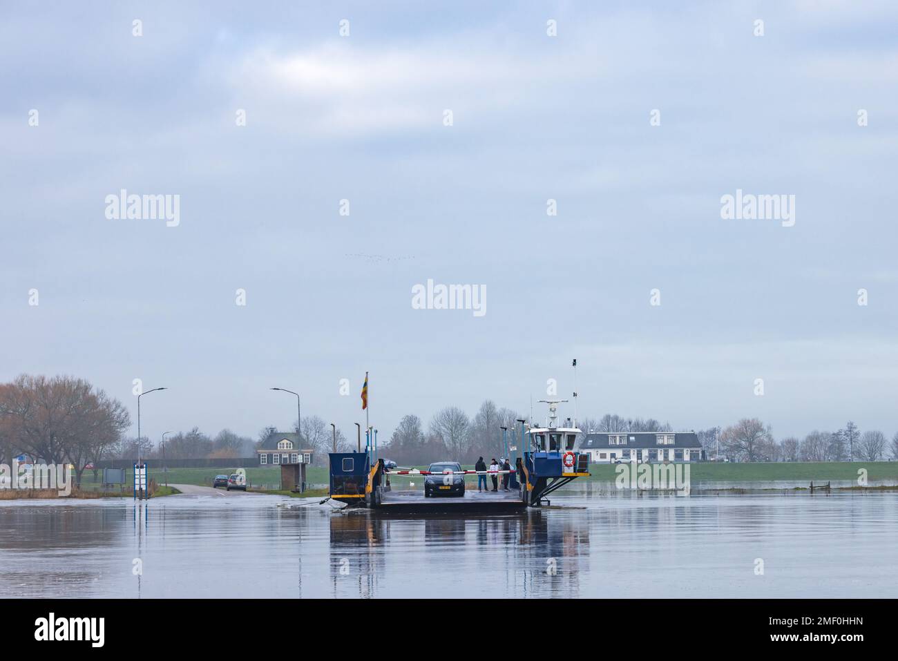 Olst Wijhe, The Netherlands - January 21, 2023: Flooded area and ferry ...
