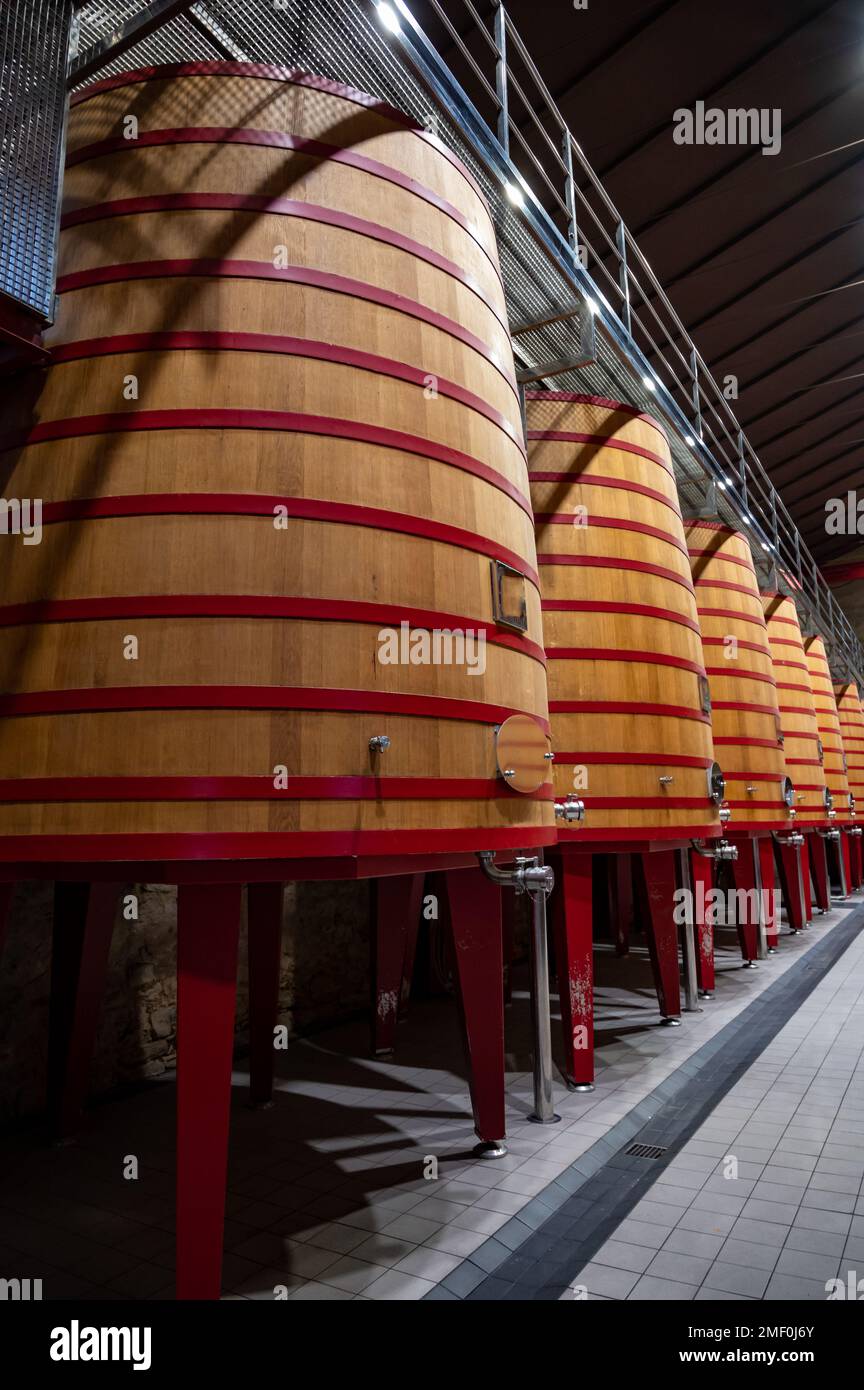 Modern large wooden barrels for wine fermentation process, red and white wine making in La Rioja ...