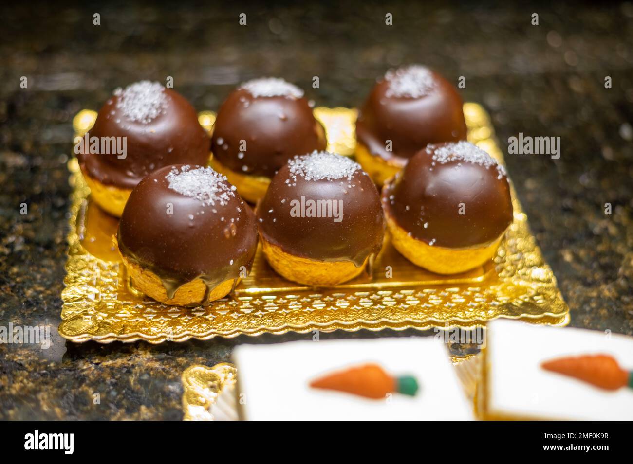 Delicious fresh baked colorful decorated cakes, tarts with cream and ...
