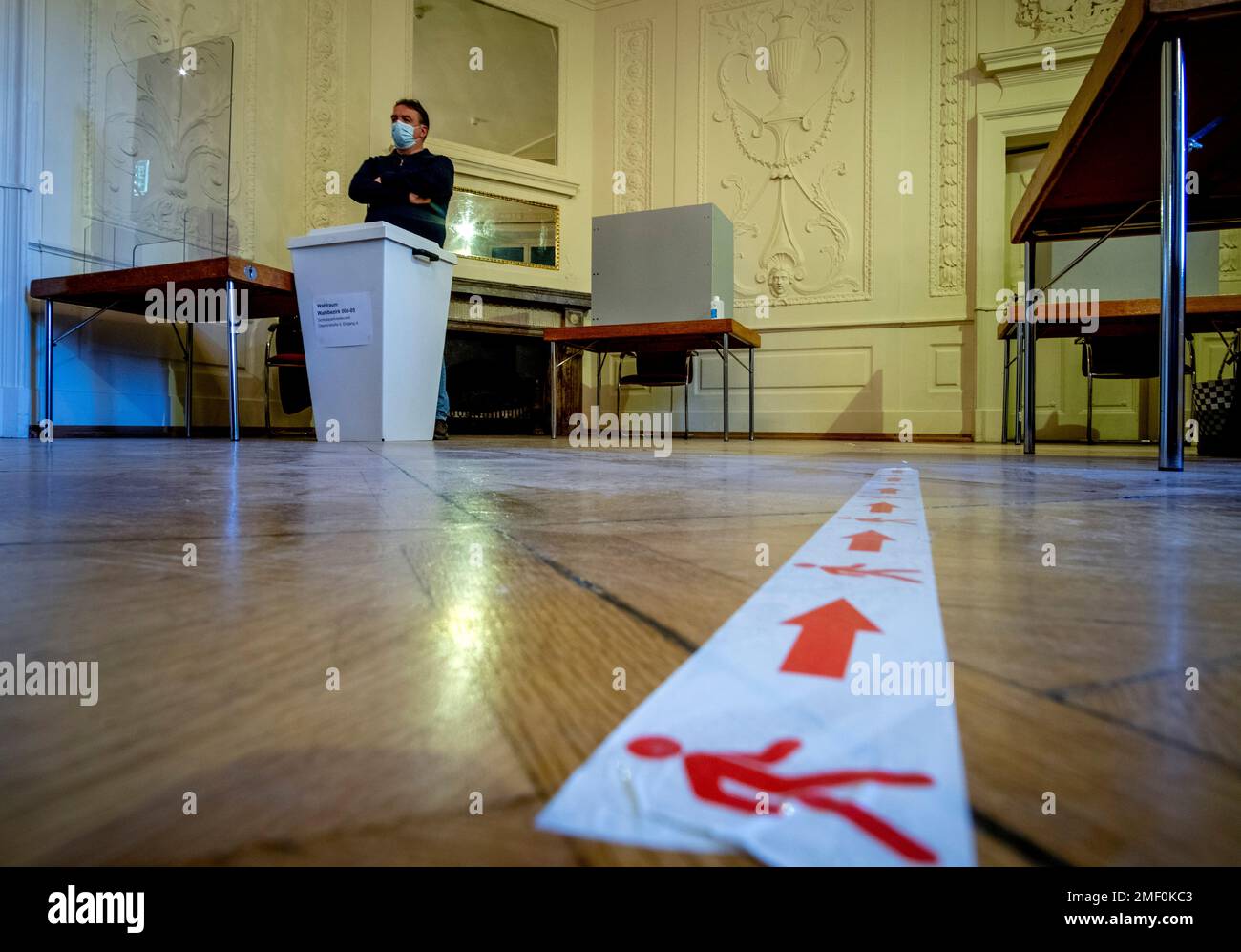 Stickers show the direction in a polling station in the castle of ...