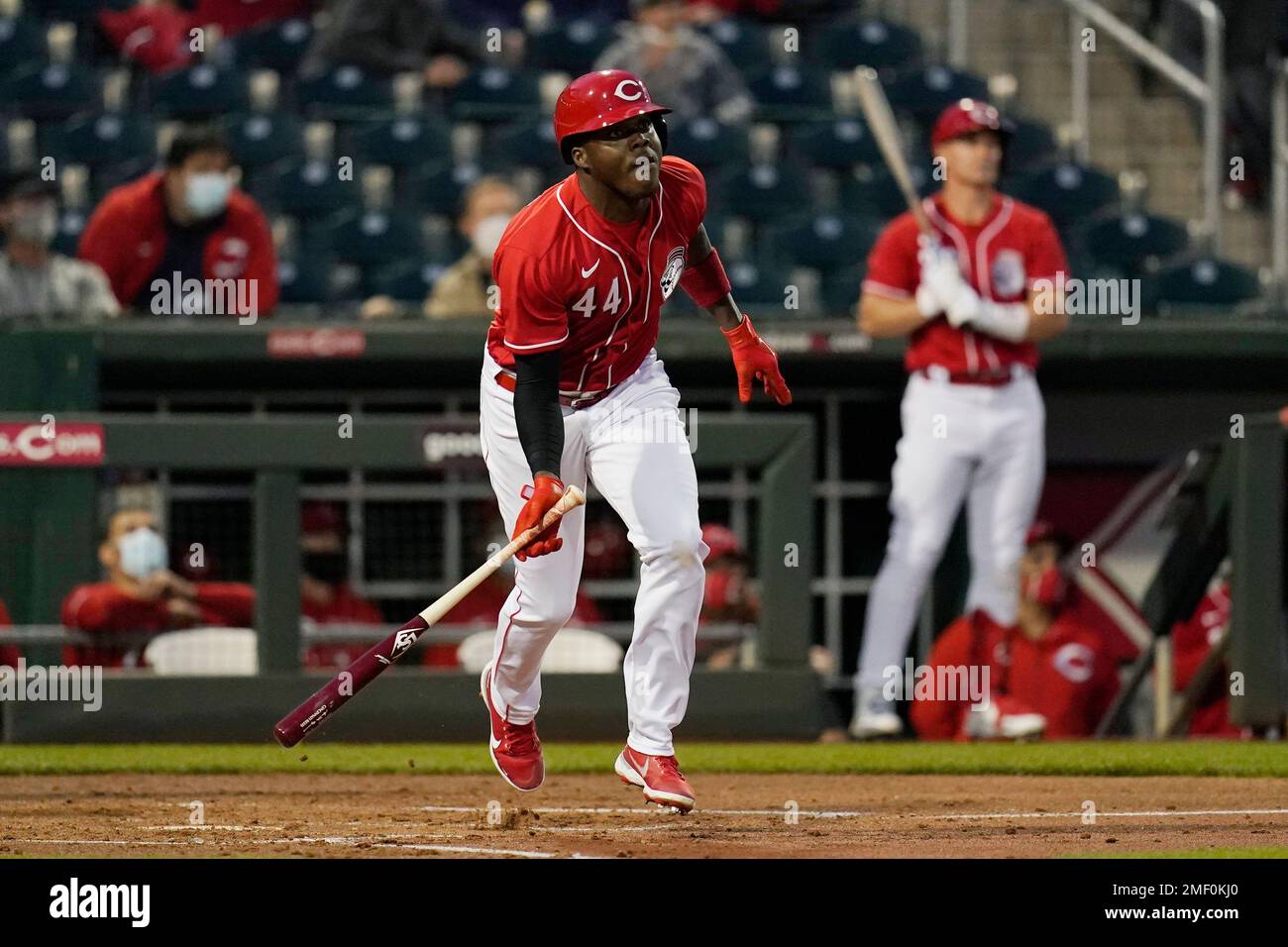 Cincinnati Reds' Aristides Aquino watches the flight of his double ...