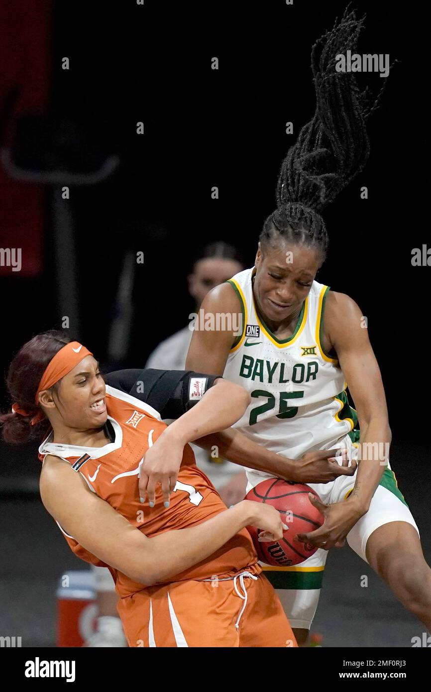 Baylor center Queen Egbo (25) rebounds against Texas forward Lauren Ebo ...
