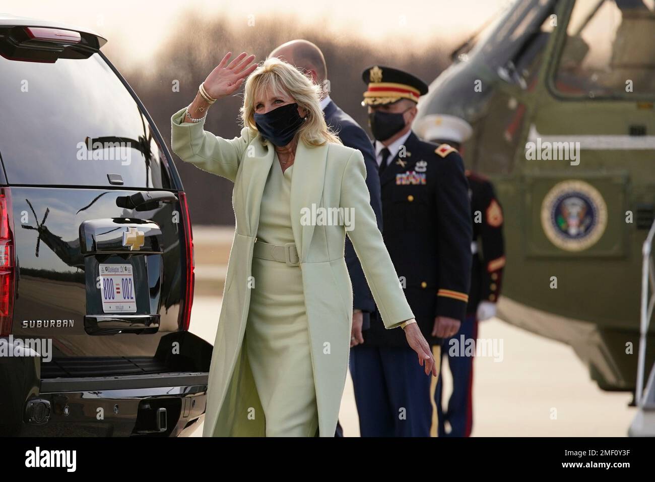 First lady Jill Biden waves as she walks to a motorcade vehicle after ...