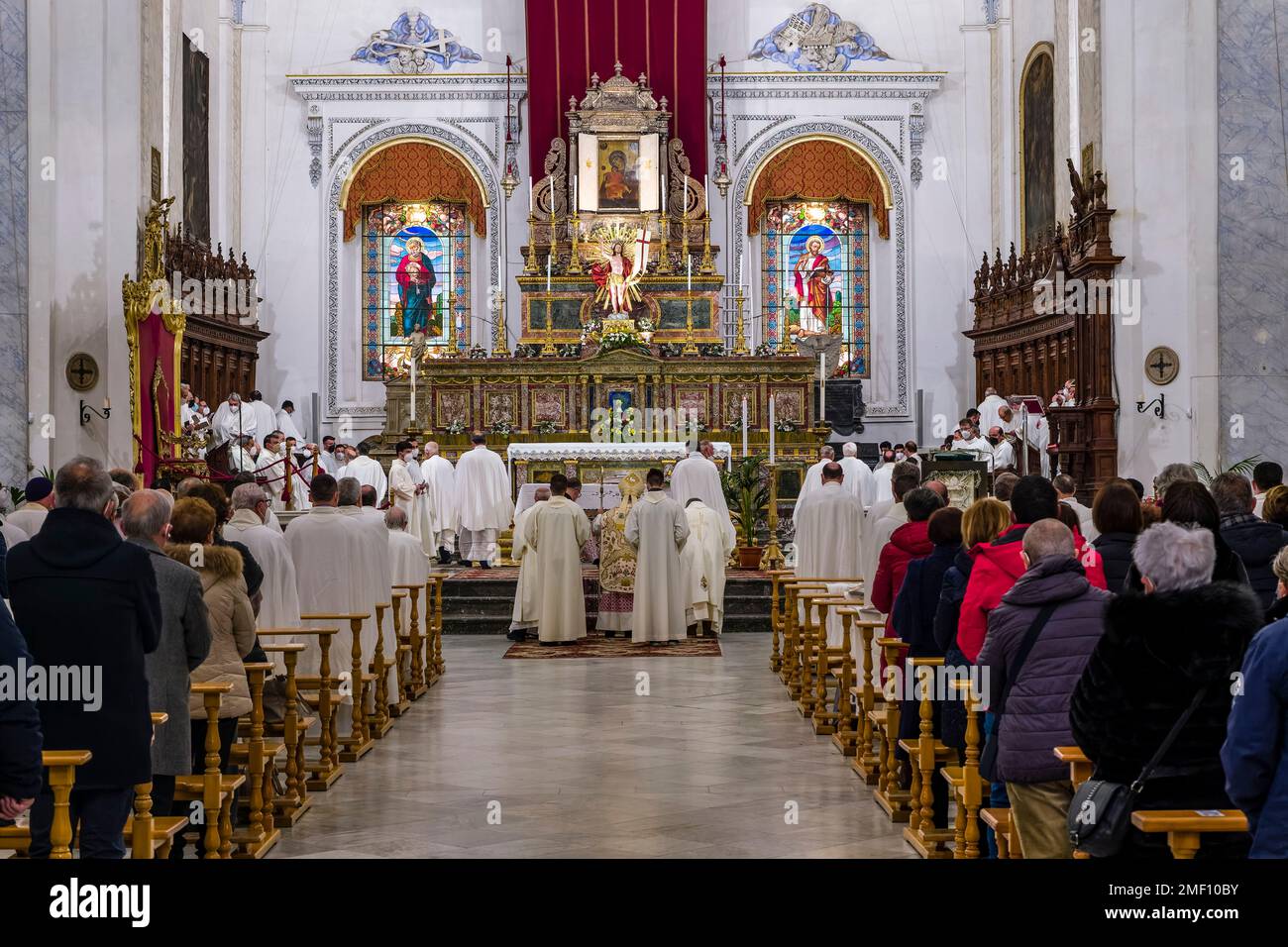 Catholic priests during a service inside the church Piazza Armerina ...
