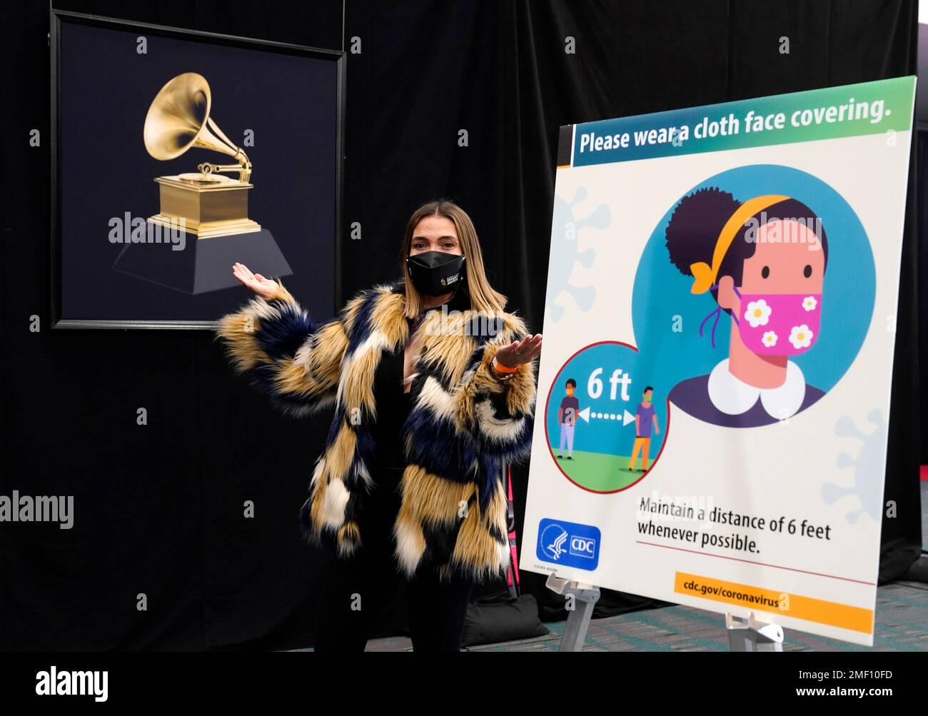 Associated Press entertainment reporter Marcela Isaza poses backstage ...