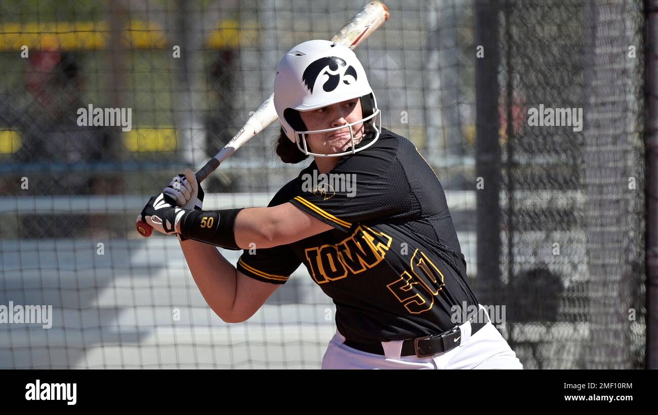 Iowa's Kalena Burns (50) follows a pitch during an NCAA college ...