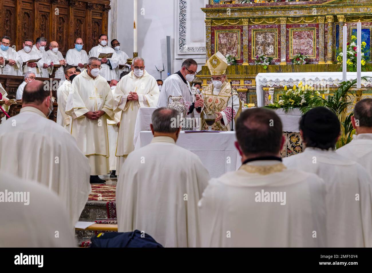 Catholic priests during a service inside the church Piazza Armerina ...