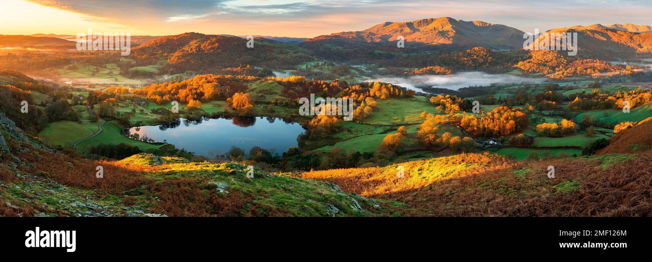 Autumn sunrise panoramic view taken from Loughrigg Fell in The Lake ...