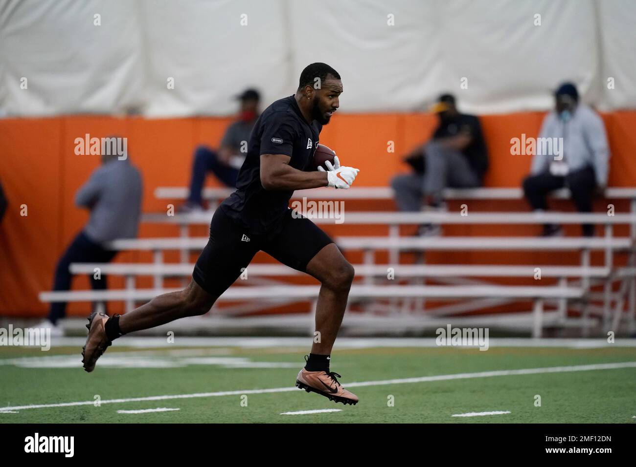 Texas wide receiver Brennan Eagles runs drills during the school's Pro ...