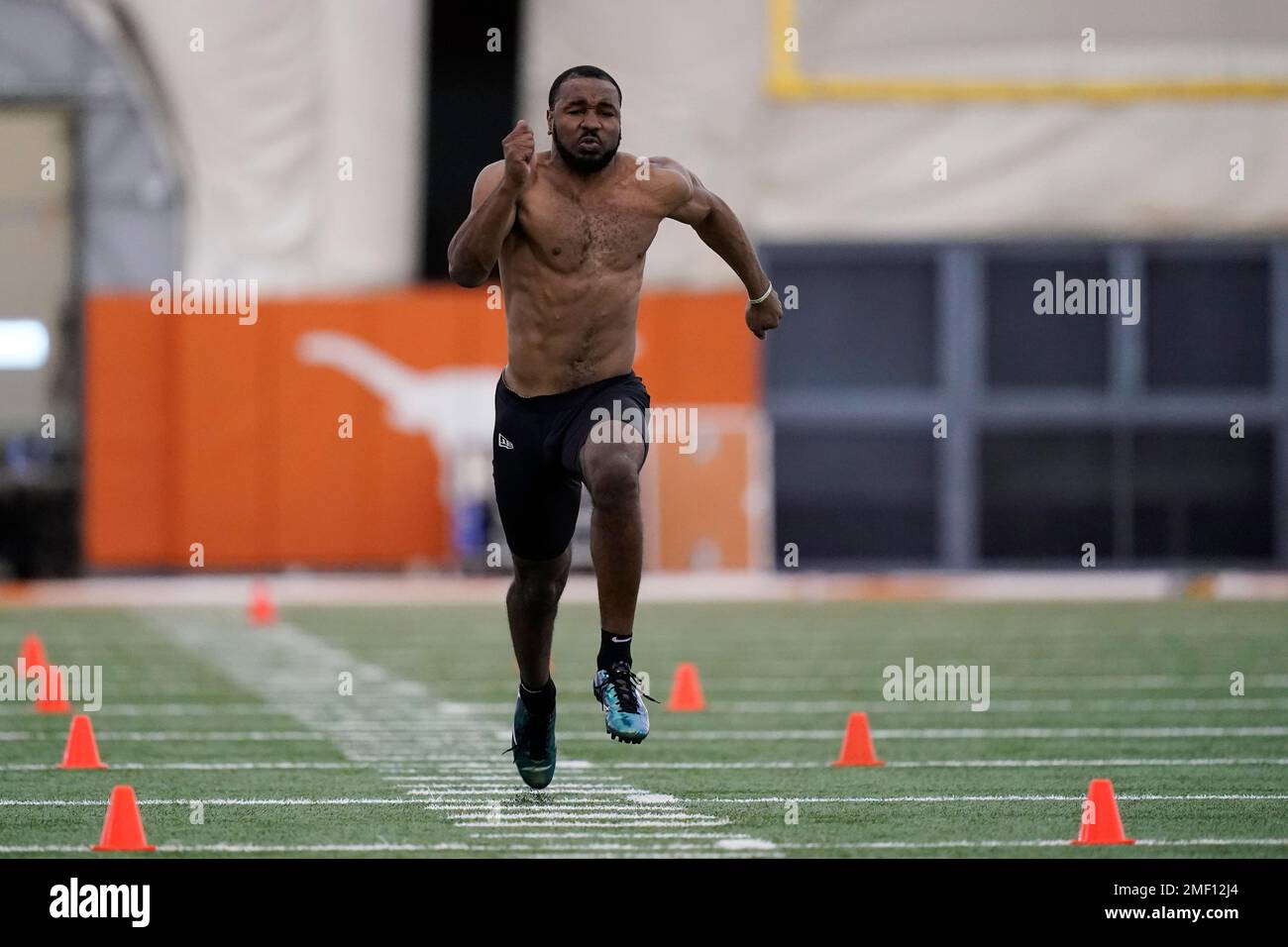 Texas wide receiver Brennan Eagles runs for scouts and coaches during ...