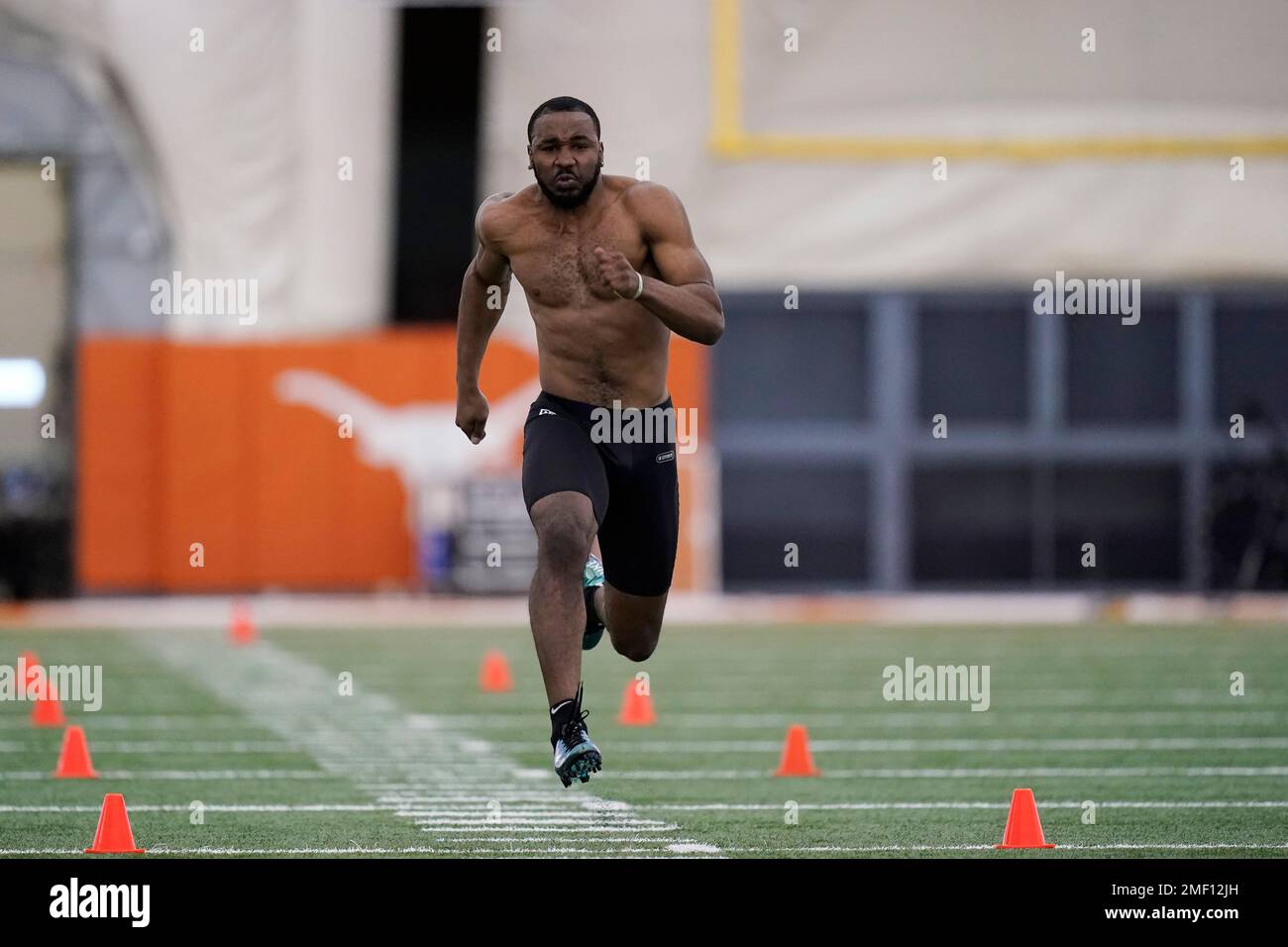 Texas wide receiver Brennan Eagles runs for scouts and coaches during ...