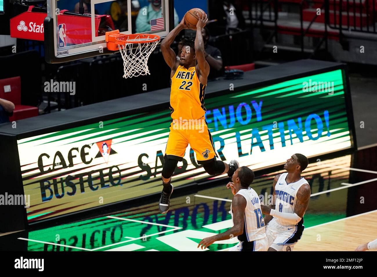 Miami Heat forward Jimmy Butler (22) dunks the ball against Orlando ...