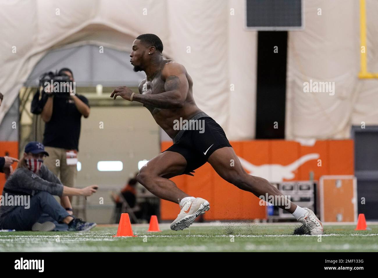 Texas defensive back Chris Brown goes through drills during the school ...