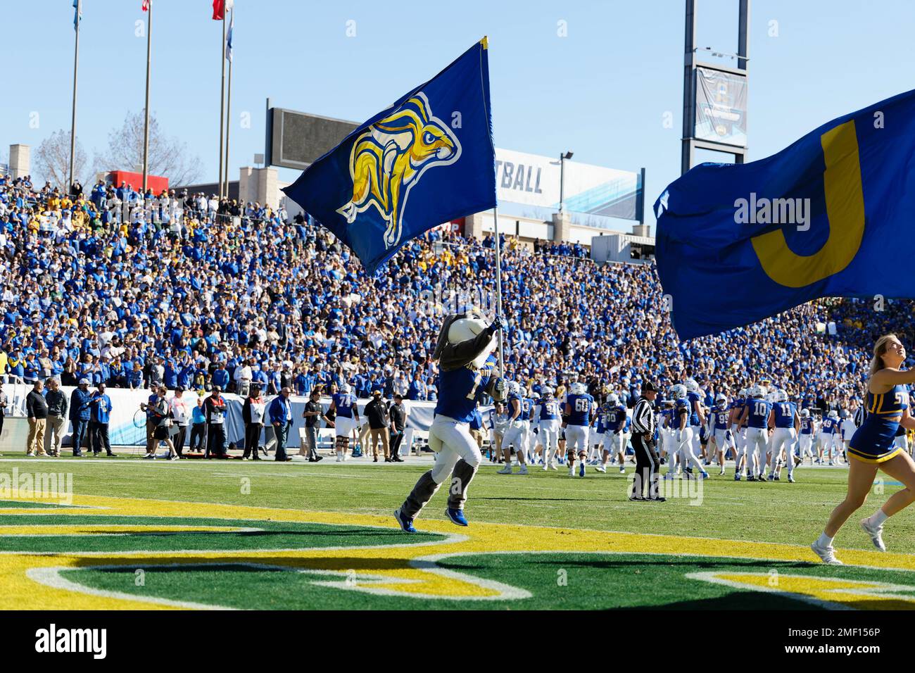 South Dakota State Jackrabbits mascot Jack runs the flag in celebration ...