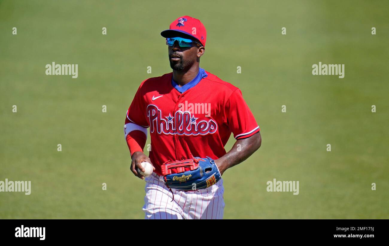 Philadelphia Phillies left fielder Andrew McCutchen runs to the dugout ...