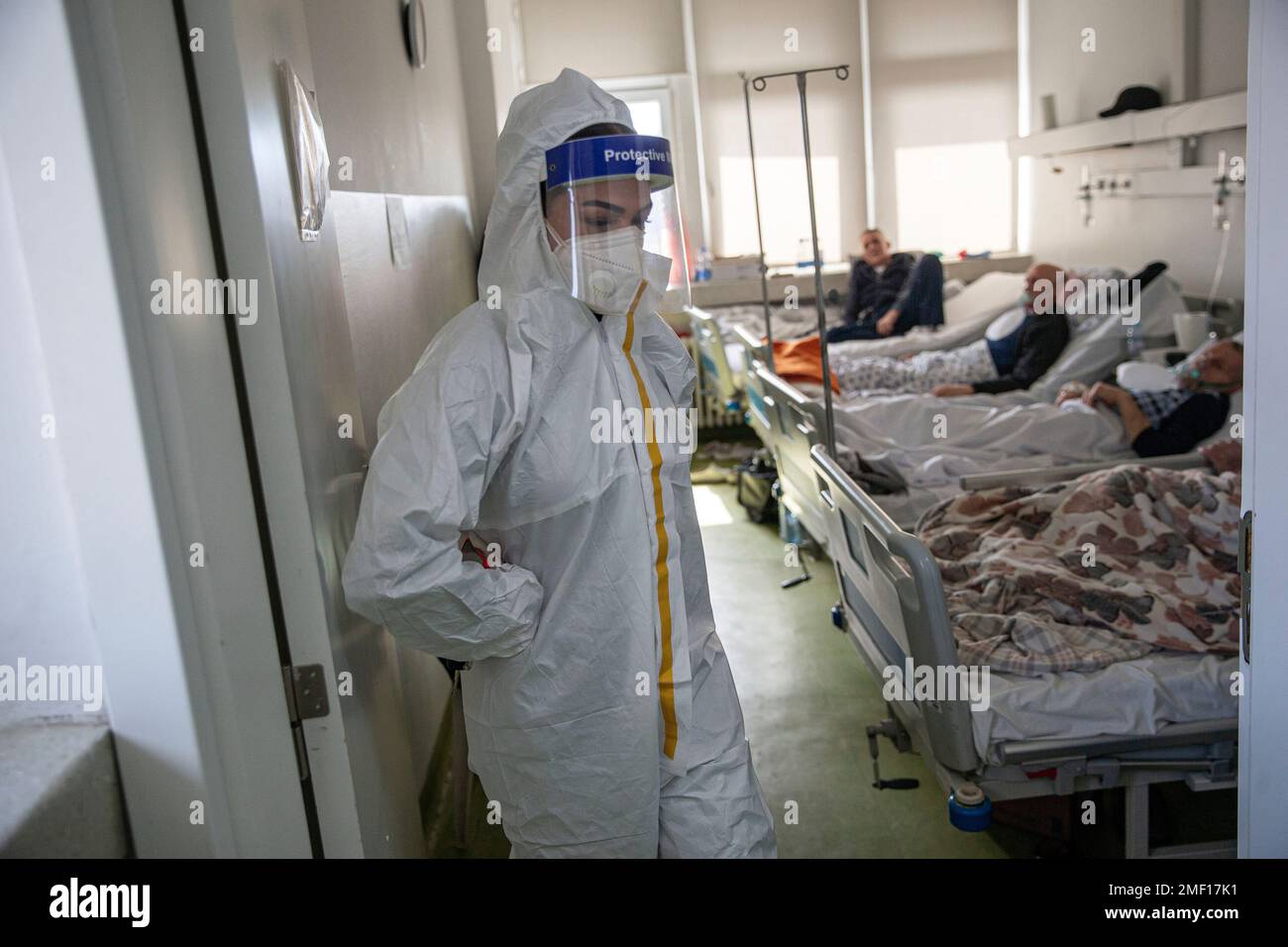 Soprano singer Arta Jashari checks a patient at the Pulmonological ...