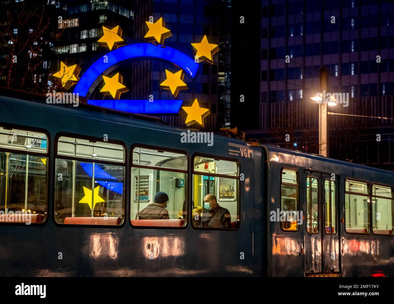People in a tram pass the Euro sculpture in Frankfurt, Germany ...
