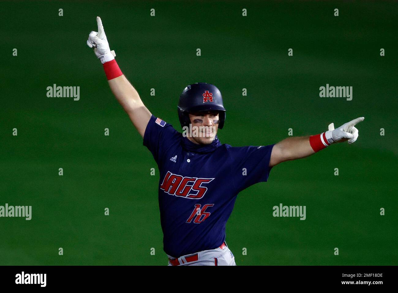 South Alabama Kaleb DeLaTorre (16) celebrates after hitting a three run ...