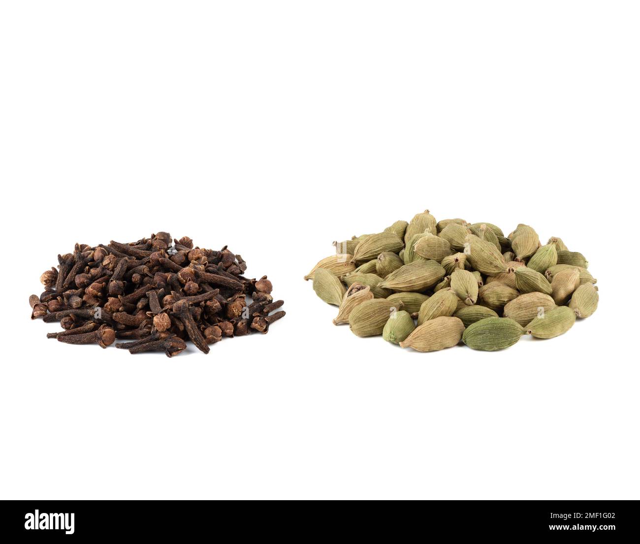 Culinary seasonings cardamom and cloves on a white background. Copy ...