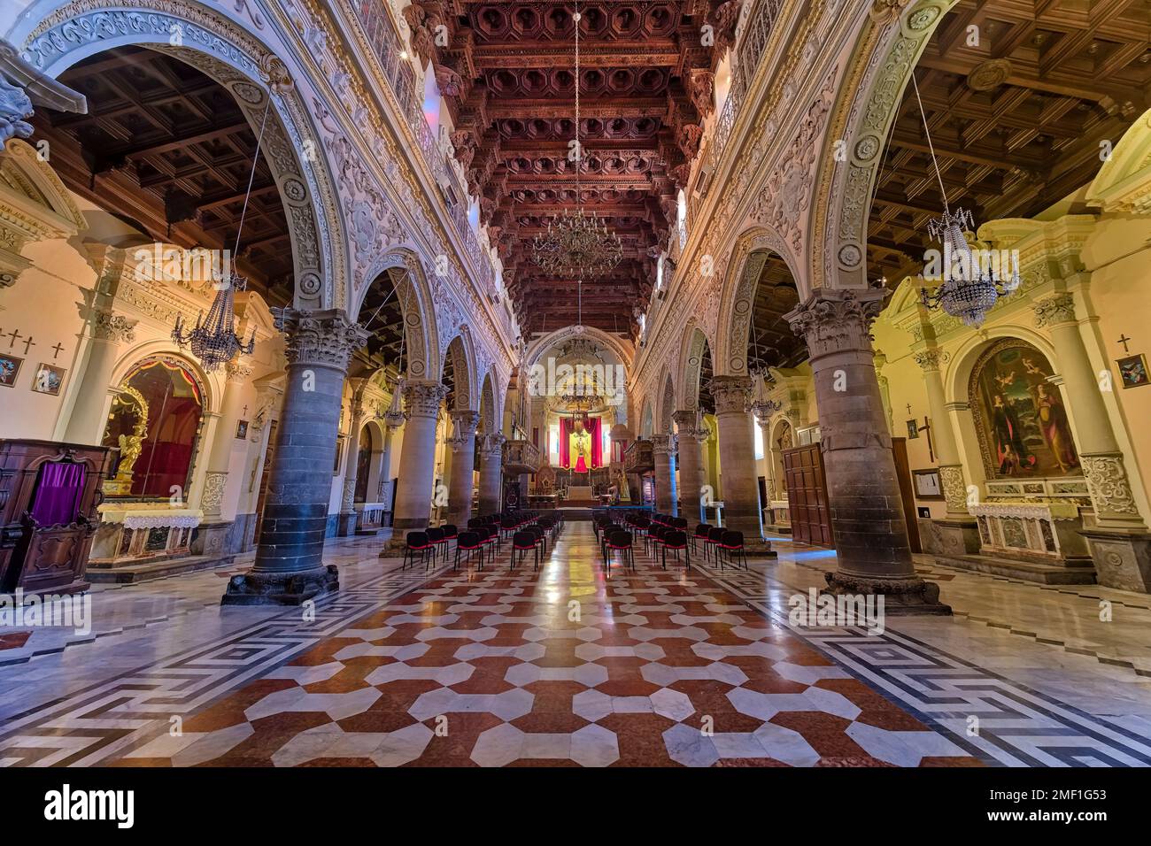 Altar, interior furnishings and carved wooden ceilings inside the ...