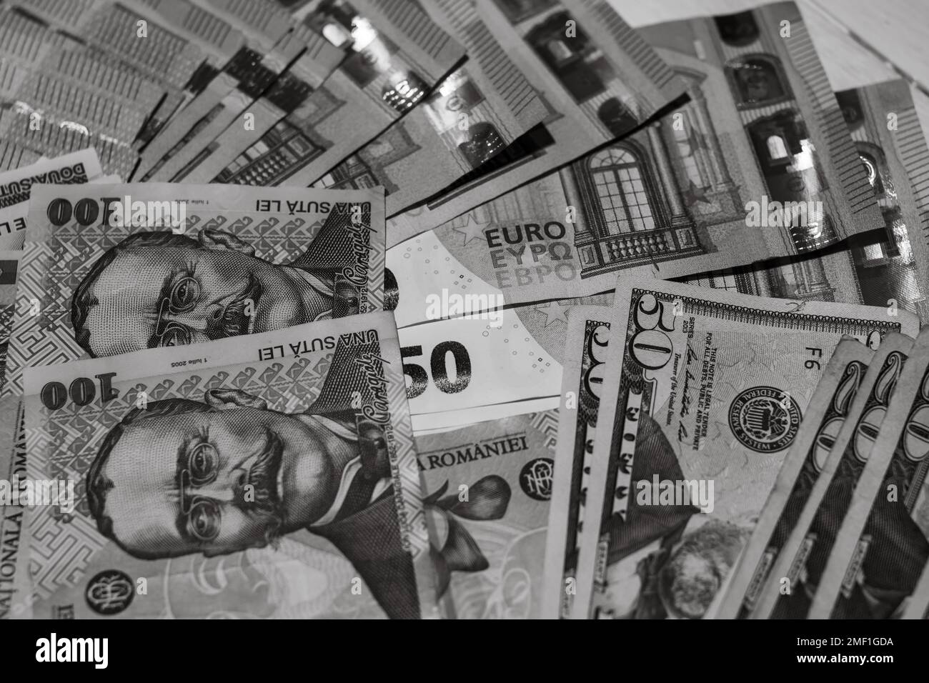 Selective focus on detail of EURO and LEI banknotes. Detail of European ...