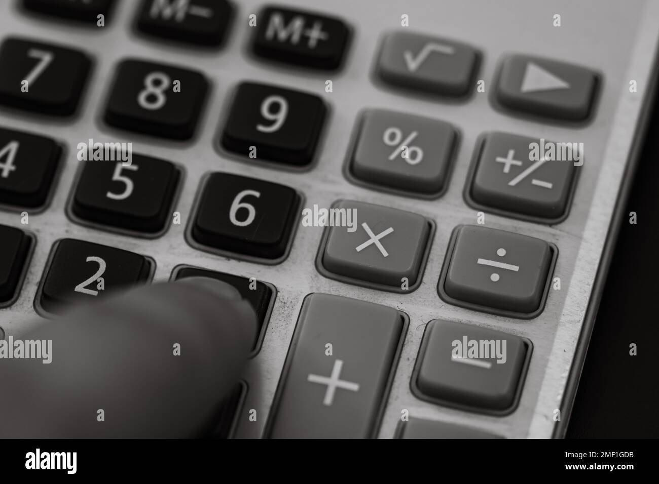 Finger pushing the button calculator. Tax concept, accounting concept ...