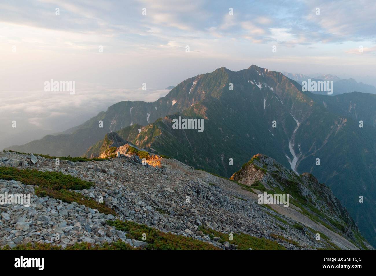 Sunrise over the Northern Japan Alps from the summit of Mount Goryu, or ...