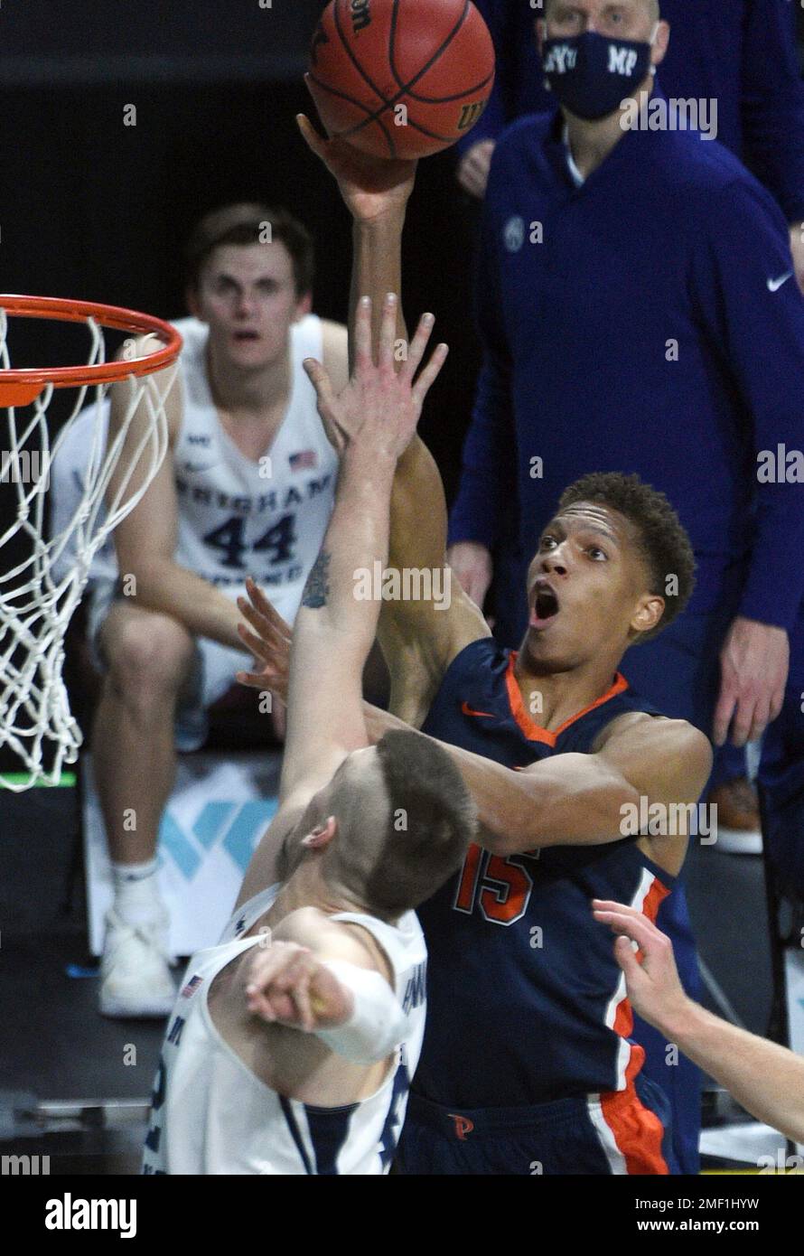 Pepperdine forward Kessler Edwards (15) shoots against BYU center ...
