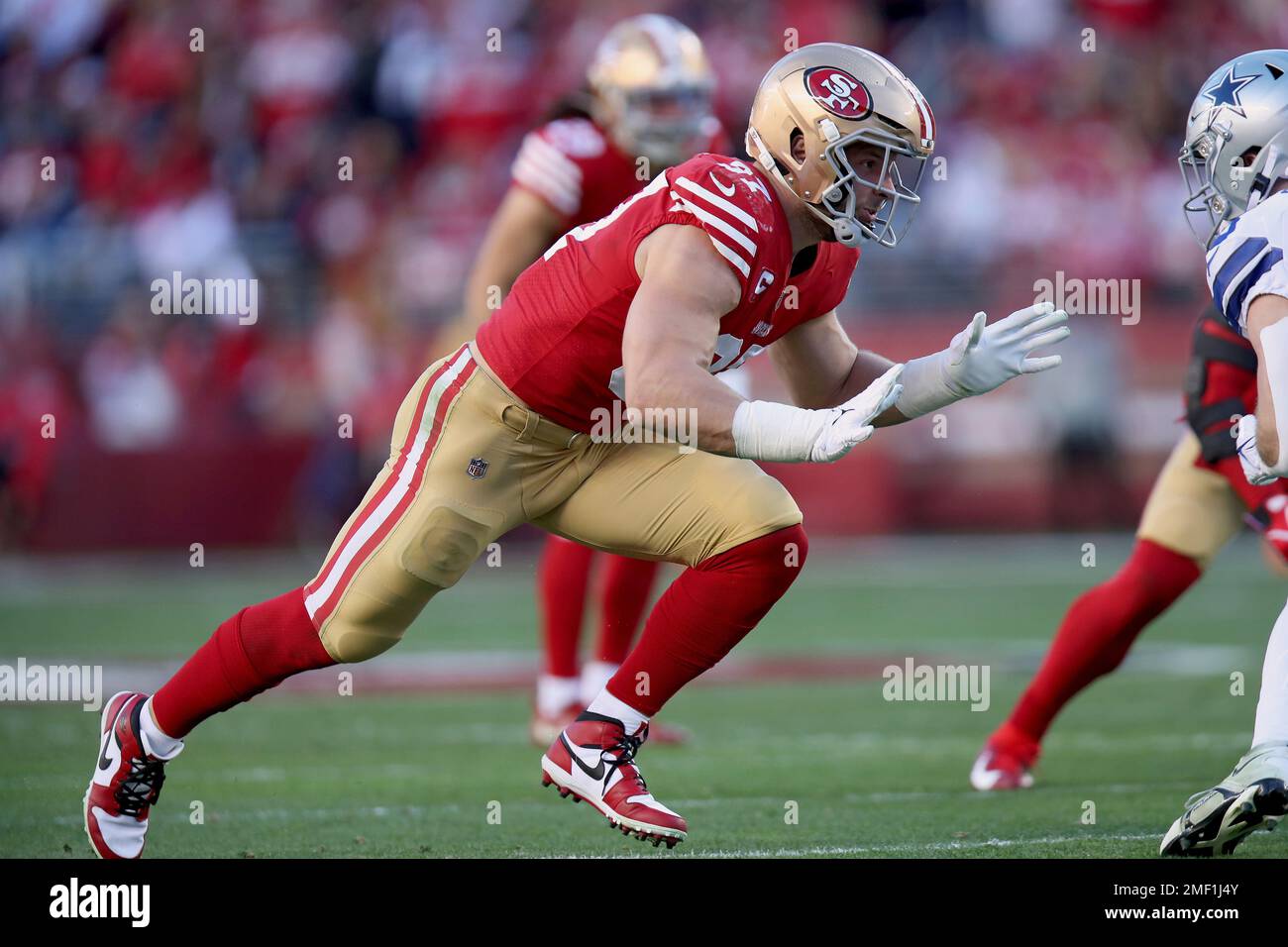 San Francisco 49ers defensive end Nick Bosa (97) rushes during an NFL ...