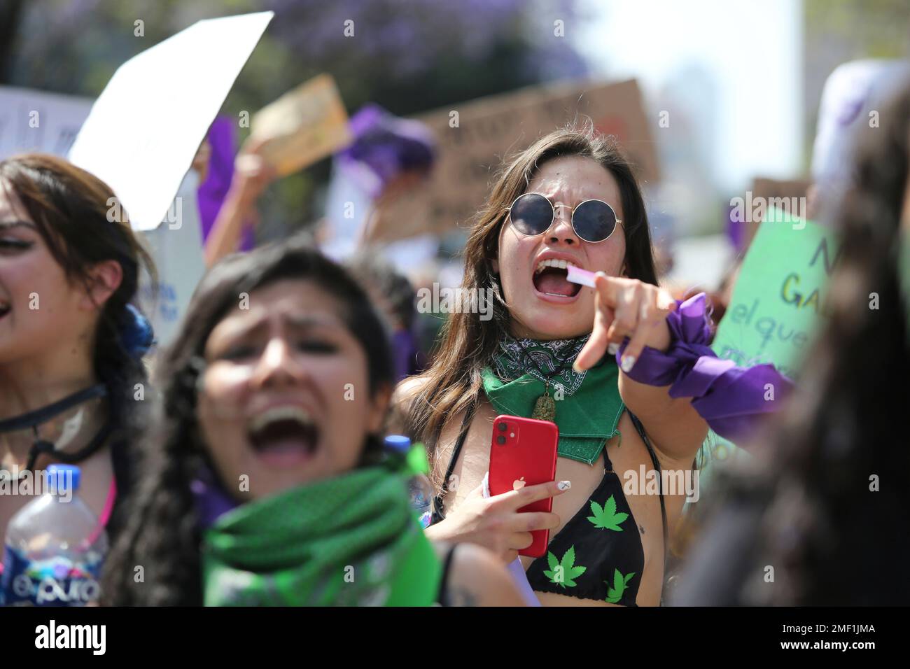 Women protest during a march to commemorate International Women's Day ...