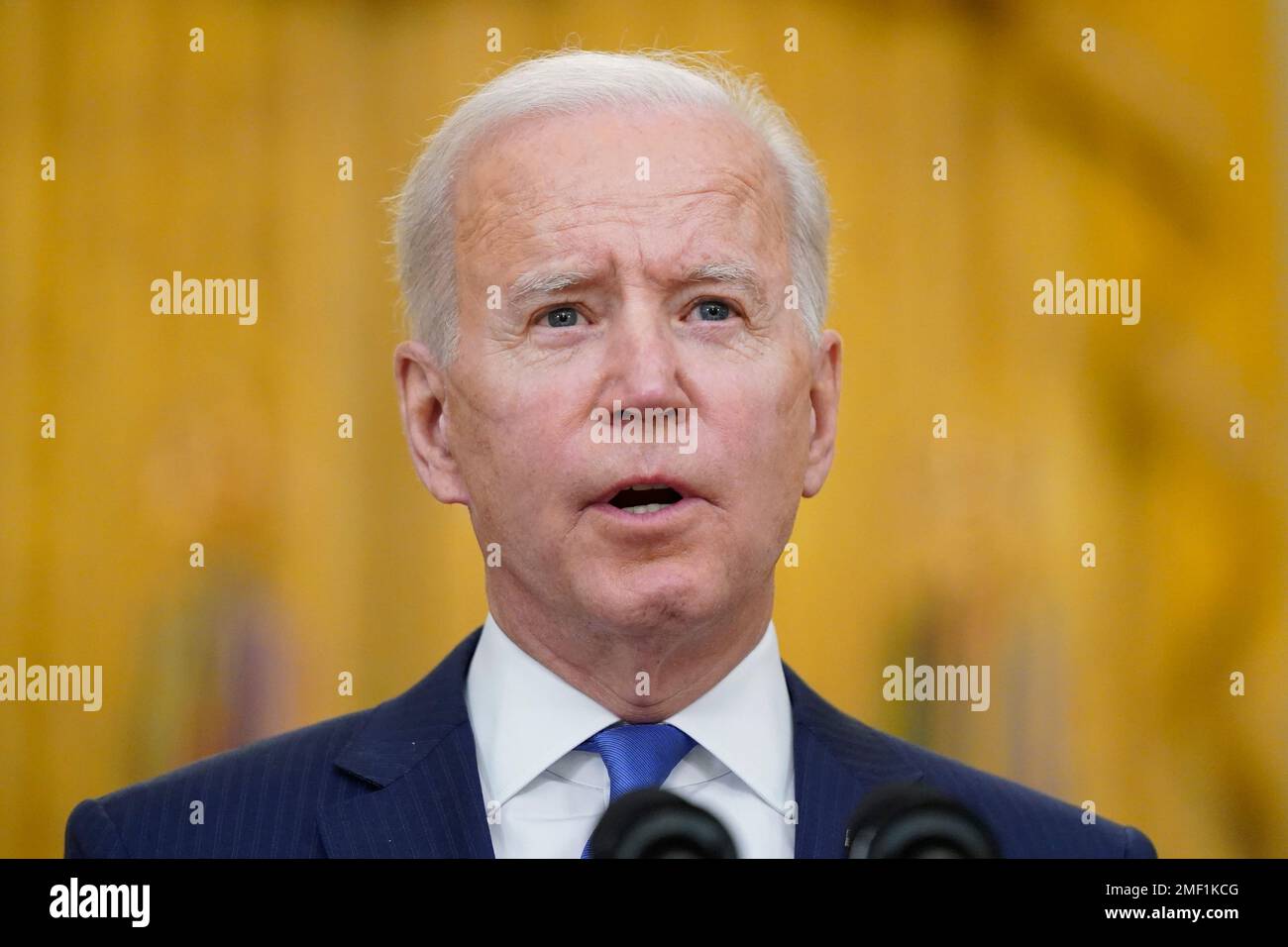 President Joe Biden speaks during an event to mark International Women ...
