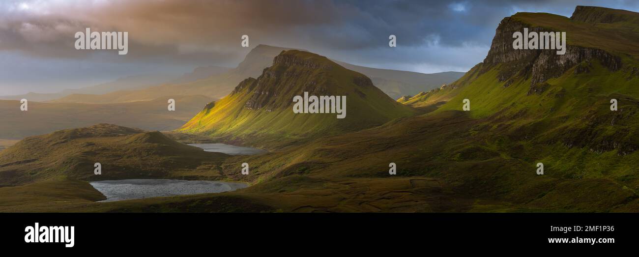 Panoramic view of dark and moody clouds above Quiraing with dramatic ...