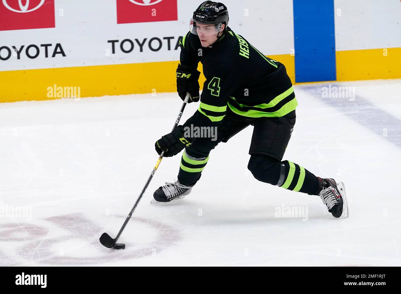 Dallas Stars' Miro Heiskanen handles the puck during an NHL hockey game ...