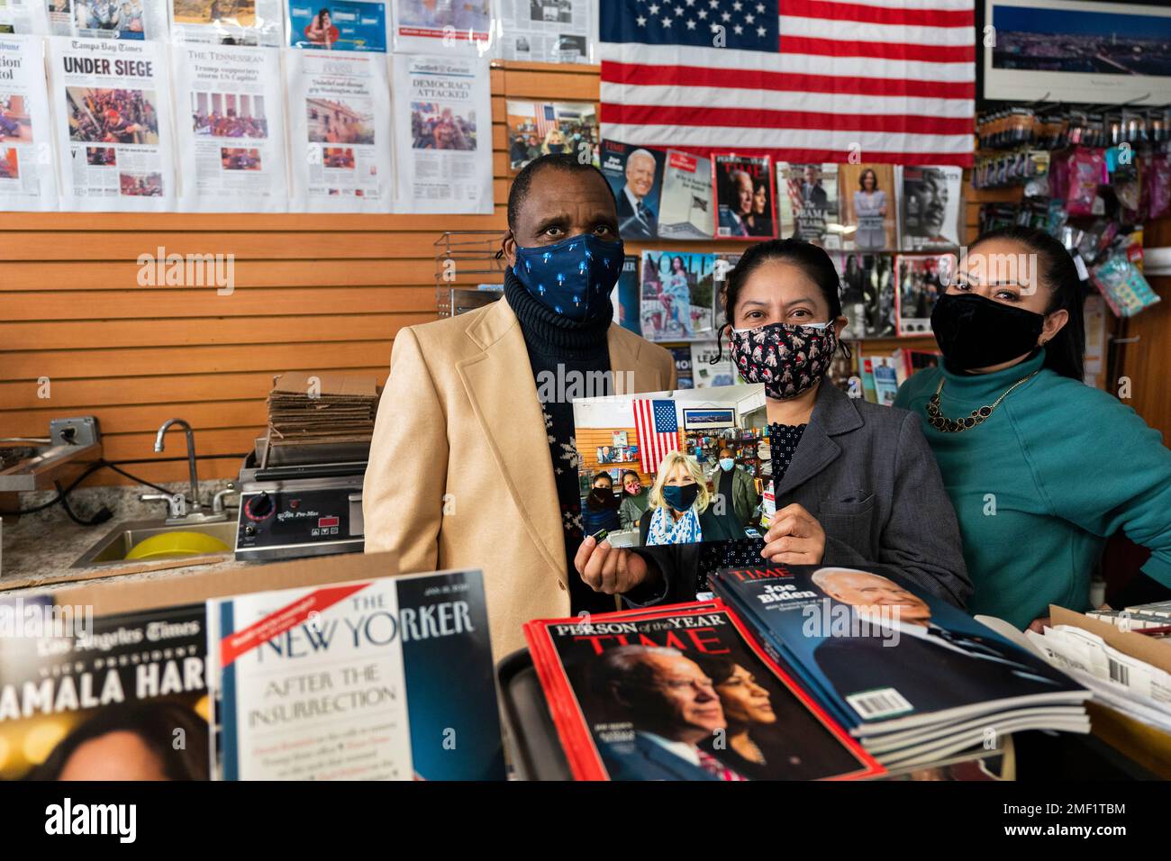 In this Feb. 19, 2021, photo from left, store owner Stephen Bota and ...
