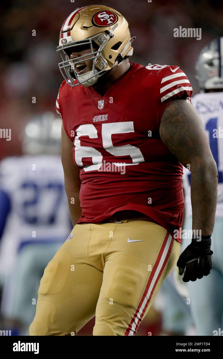San Francisco 49ers guard Aaron Banks (65) reacts during an NFL ...