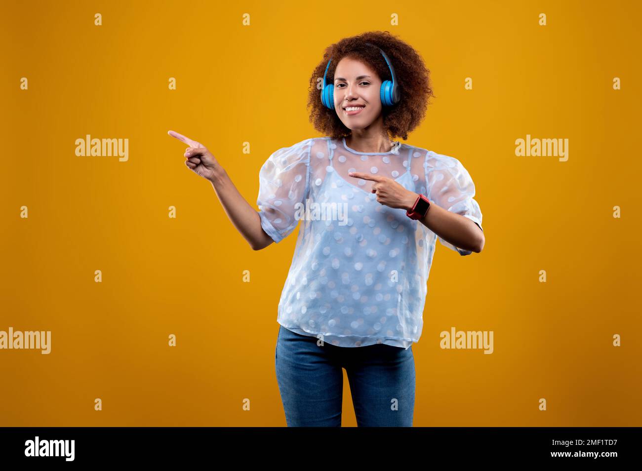 Curly woman listening dance music hi-res stock photography and images ...