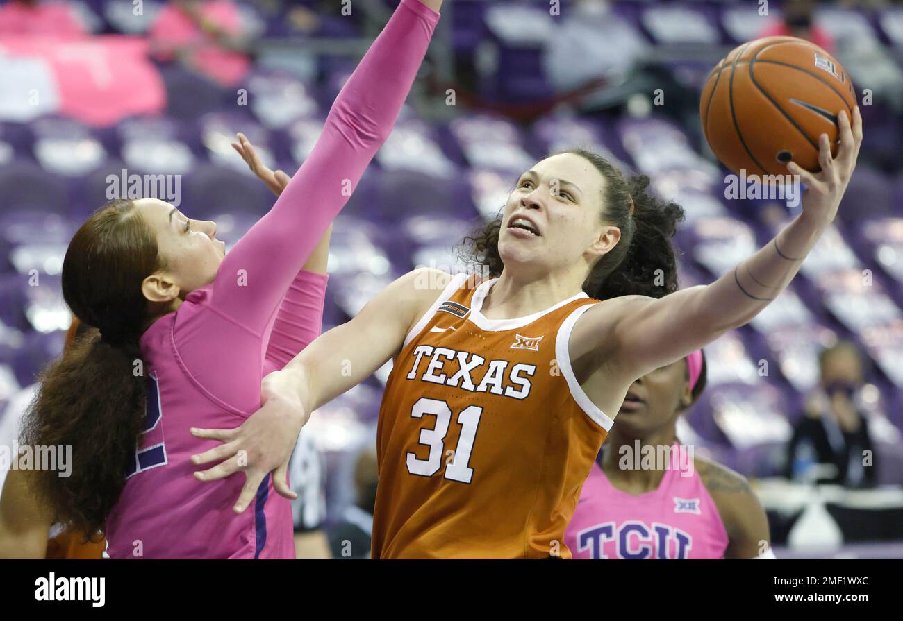 Texas guard Audrey Warren (31) shoots over TCU forward Patricia Morris ...
