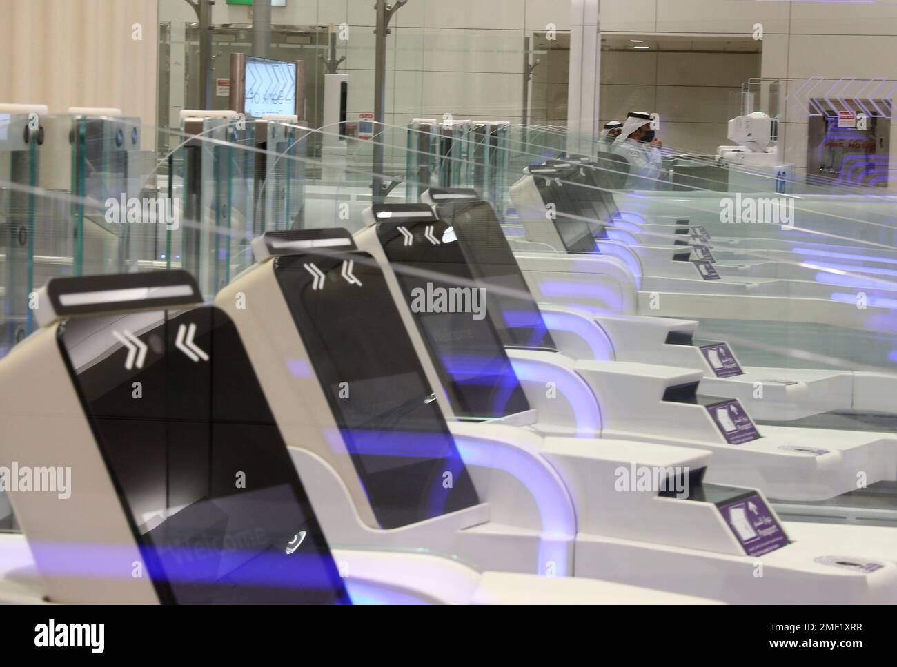 Face and iris-recognition gates are shown during a media tour at Dubai ...