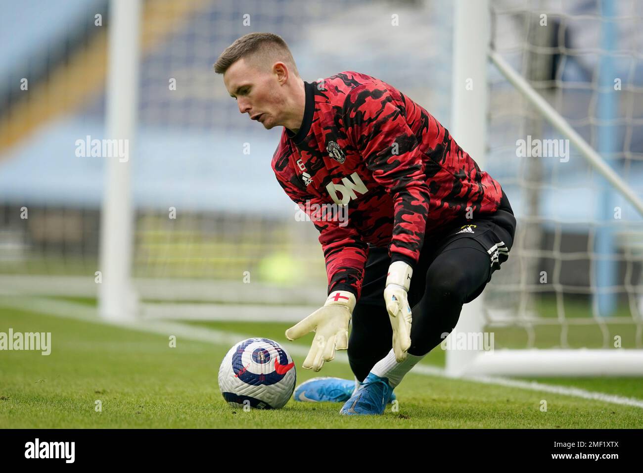 Manchester United's goalkeeper Dean Henderson catches a ball during ...