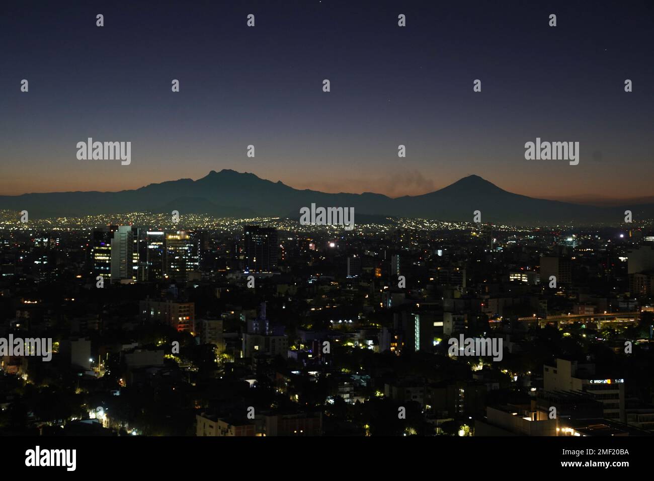 The sun begins to rise in Mexico City, Tuesday, Jan. 24, 2023. (AP ...