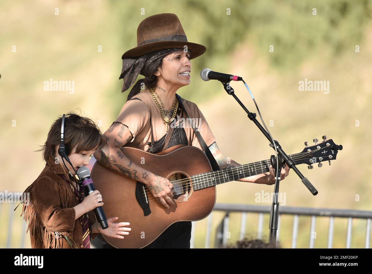 Linda Perry and her son Rhodes perform "What's? Up" during Rock 'N ...