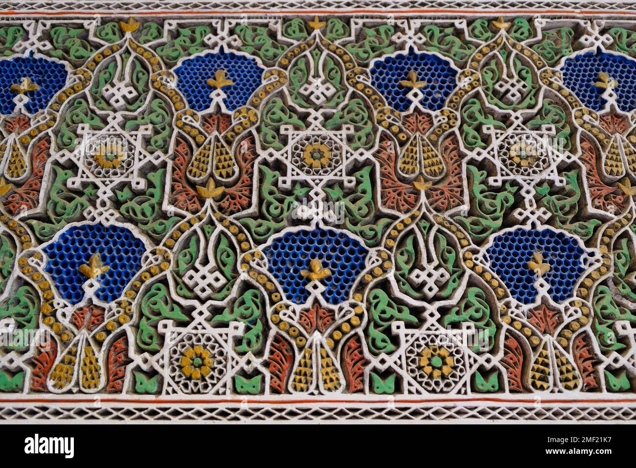 Fez, Morocco - close-up of wall with carved, painted stucco. Moroccan ...