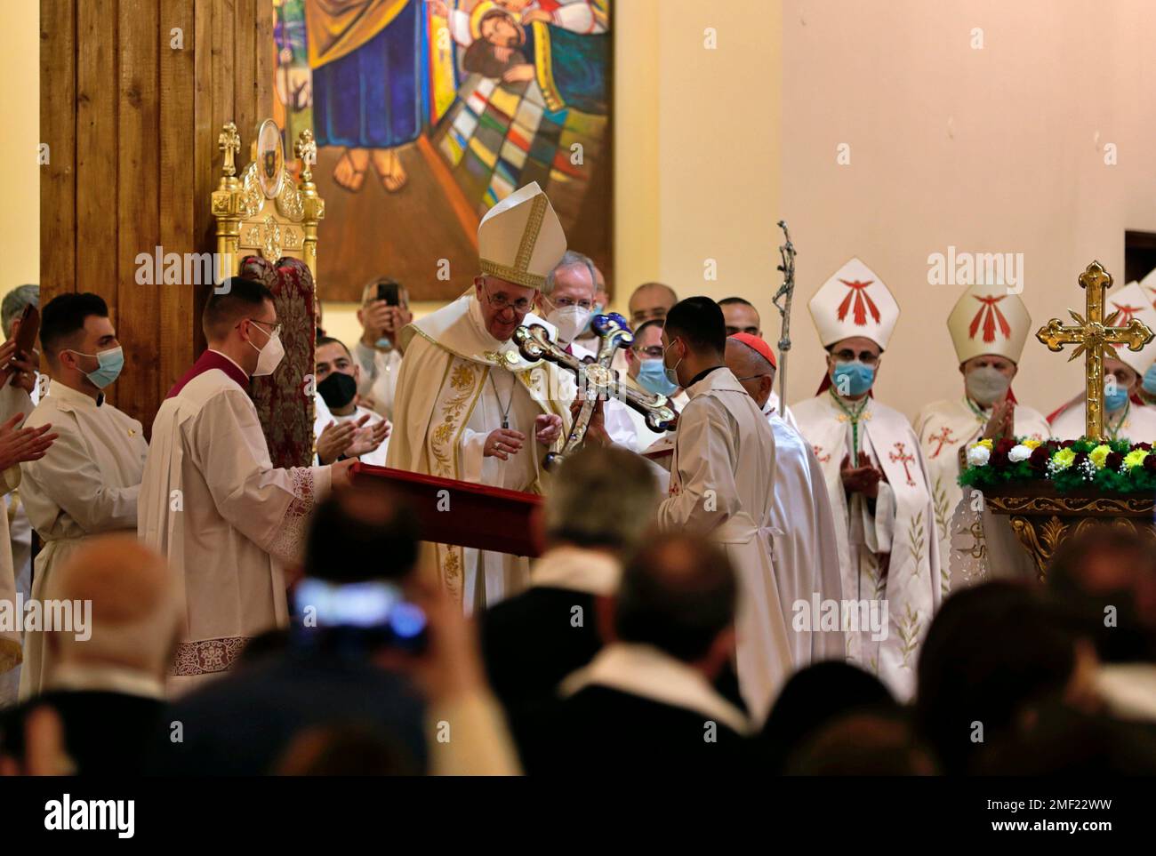 Pope Francis, center, celebrates mass at Mar Youssef Church in Baghdad ...