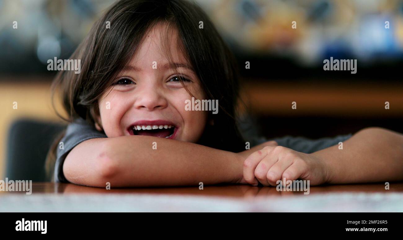One happy child laughing and smiling small girl Stock Photo - Alamy