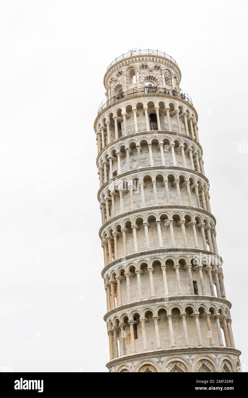 Close up of iconic leaning tower of Pisa with white sky, Tuscany, Italy ...