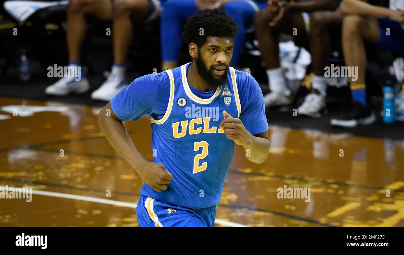 UCLA forward Cody Riley (2) runs up the floor during the first half of ...