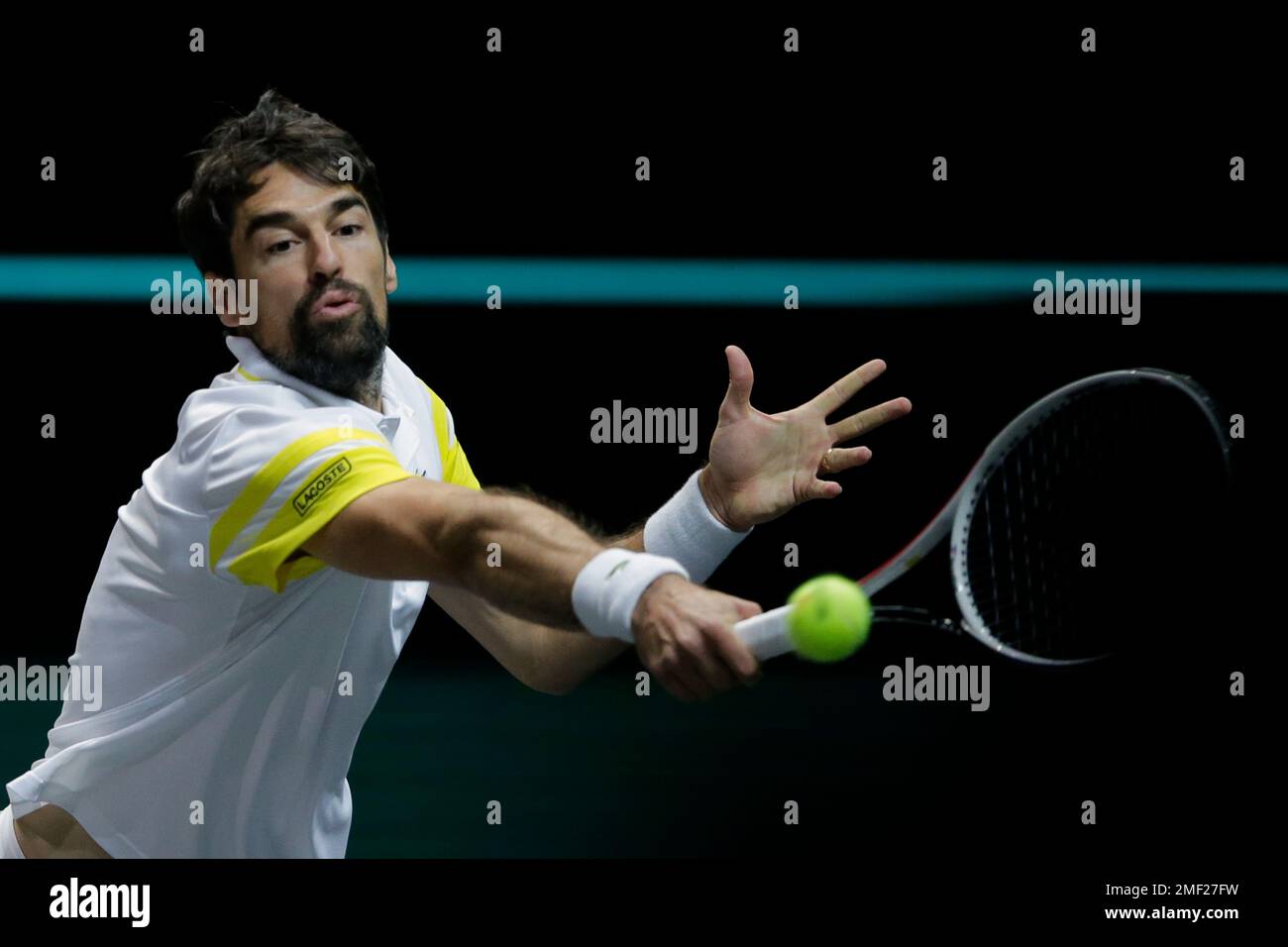 France's Jeremy Chardy plays a shot against Russia's Andrey Rublev in ...
