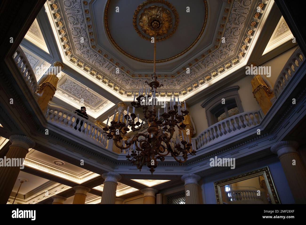An out-of-work French culture and tourism worker stands at a balcony ...